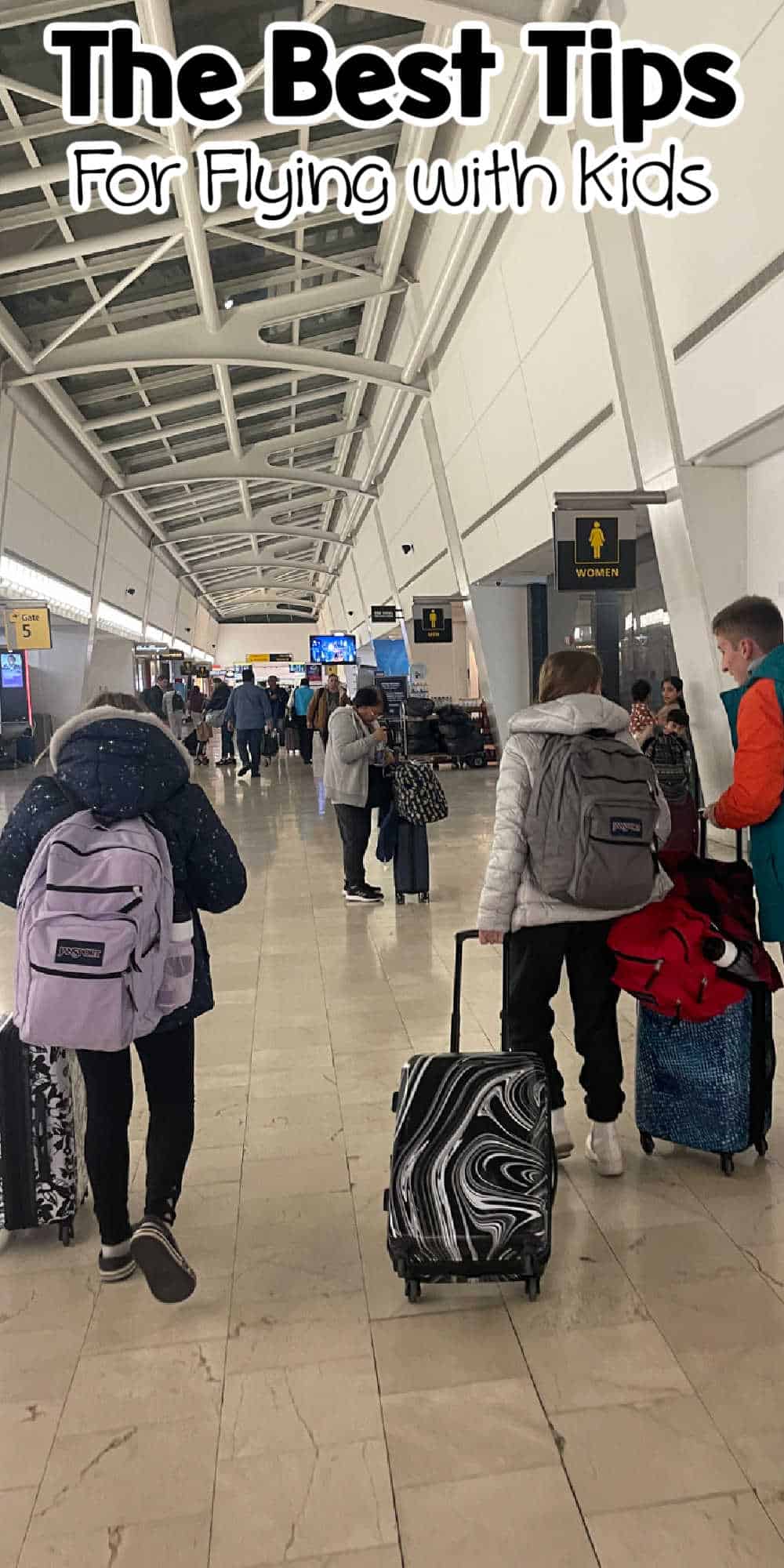Tips for Flying with Kids (From a Mom with 4 kids)